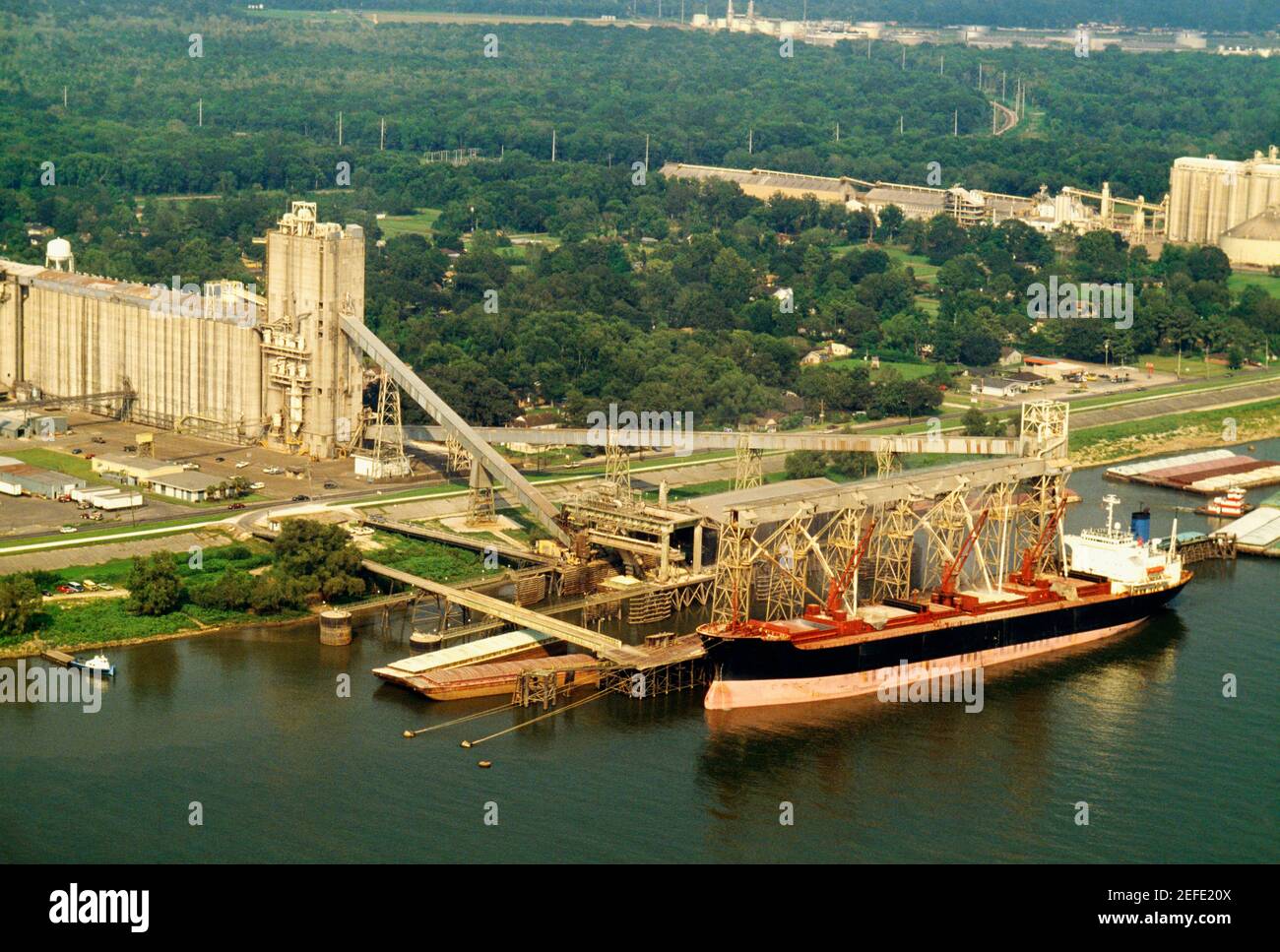 Aerial view of container ships being loaded with grain, Mississippi ...