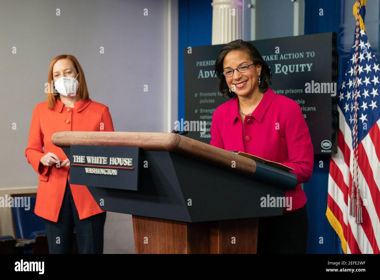 White House Press Secretary Jen Psaki looks on as Domestic Policy ...