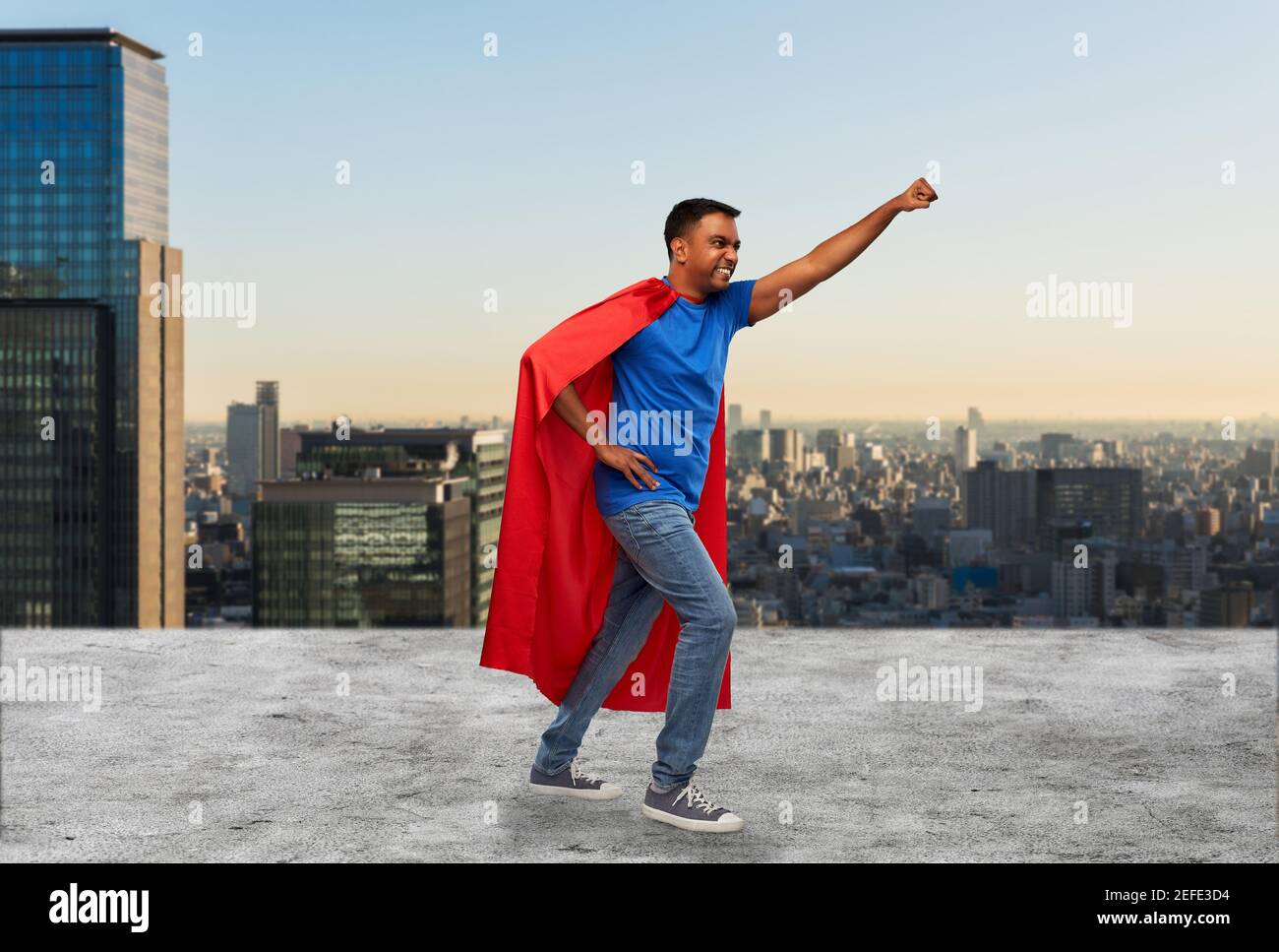 indian man in superhero cape makes winning gesture Stock Photo - Alamy