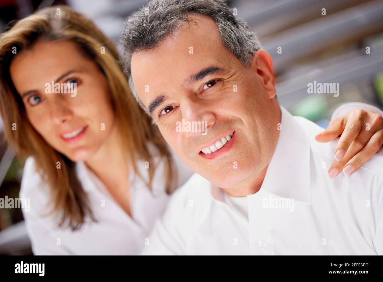 Portrait of a mid adult couple smiling Stock Photo - Alamy