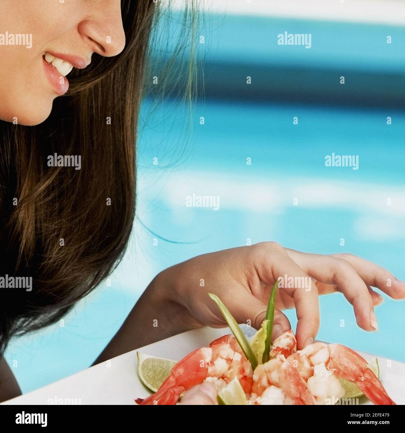 Picking food of platter hi-res stock photography and images - Alamy