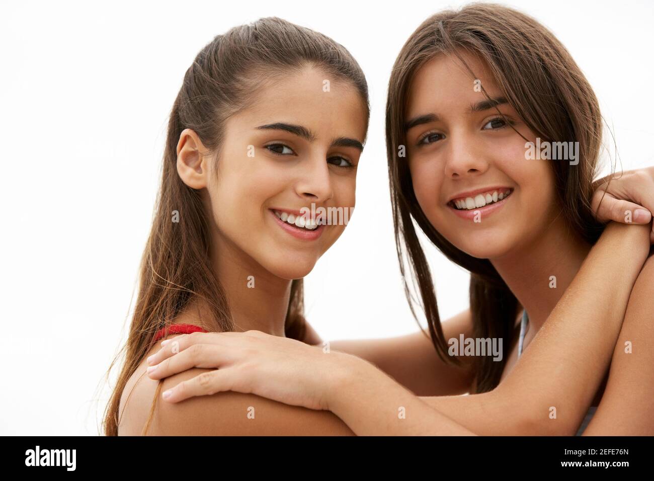 Portrait of two girls smiling Stock Photo - Alamy