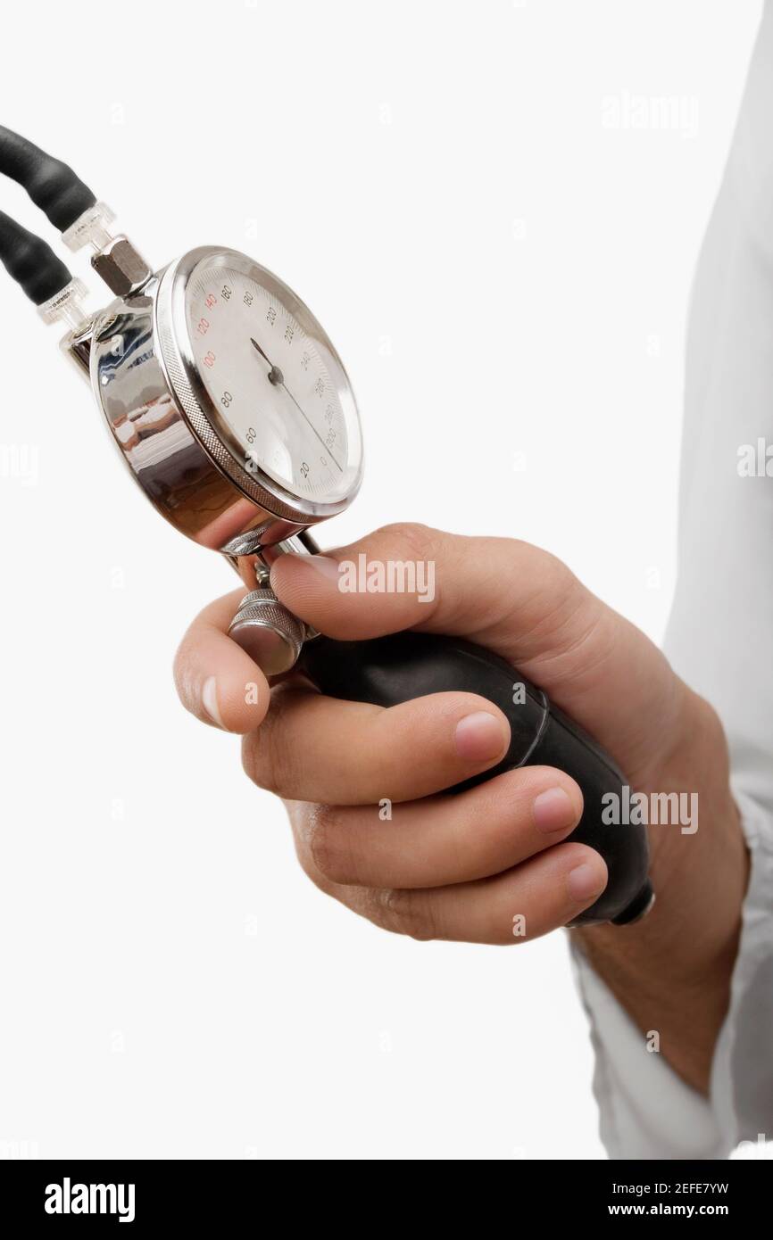 Close up hand holding blood gauge hi-res stock photography and images ...