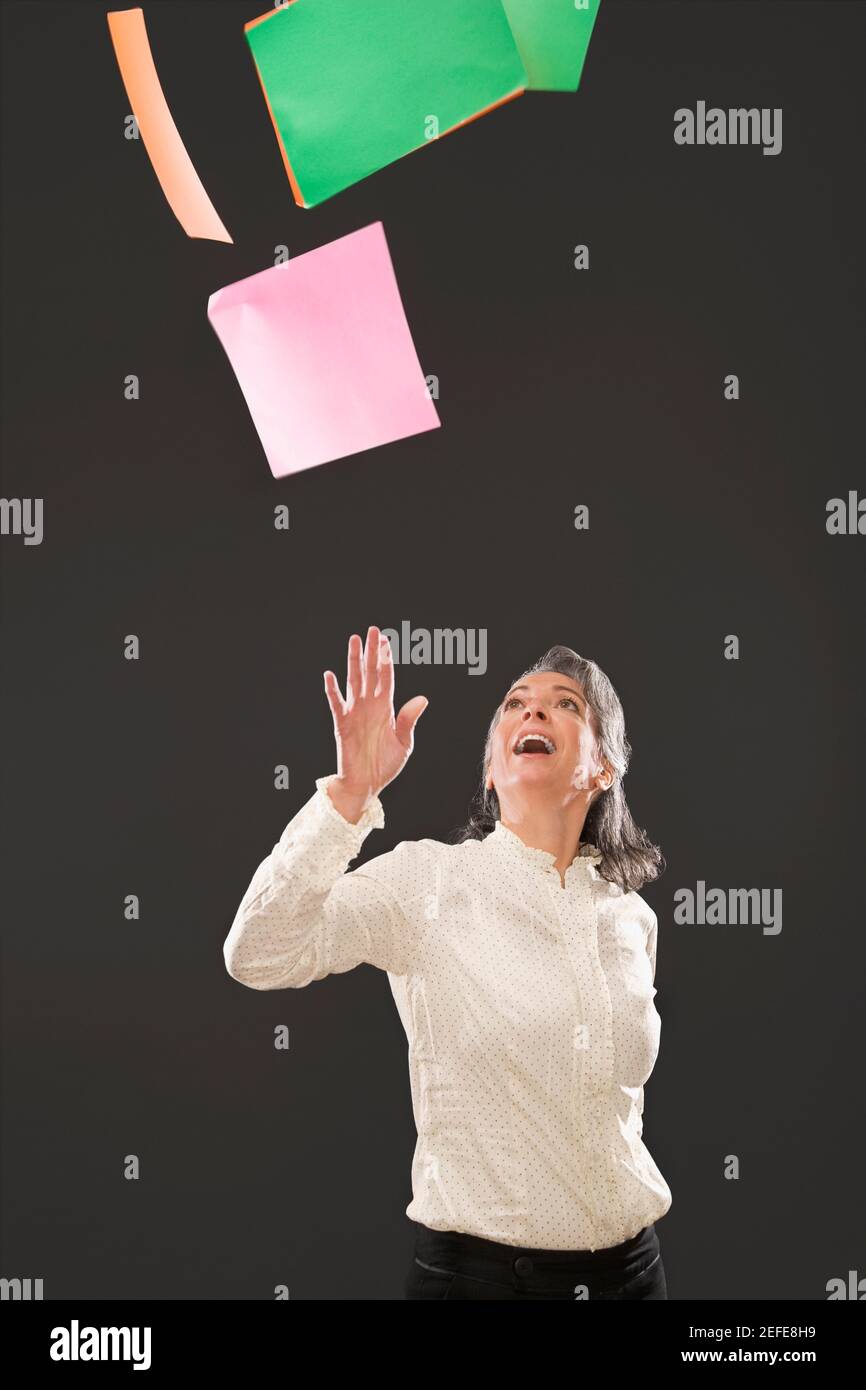 Throwing papers in the air hi-res stock photography and images - Alamy