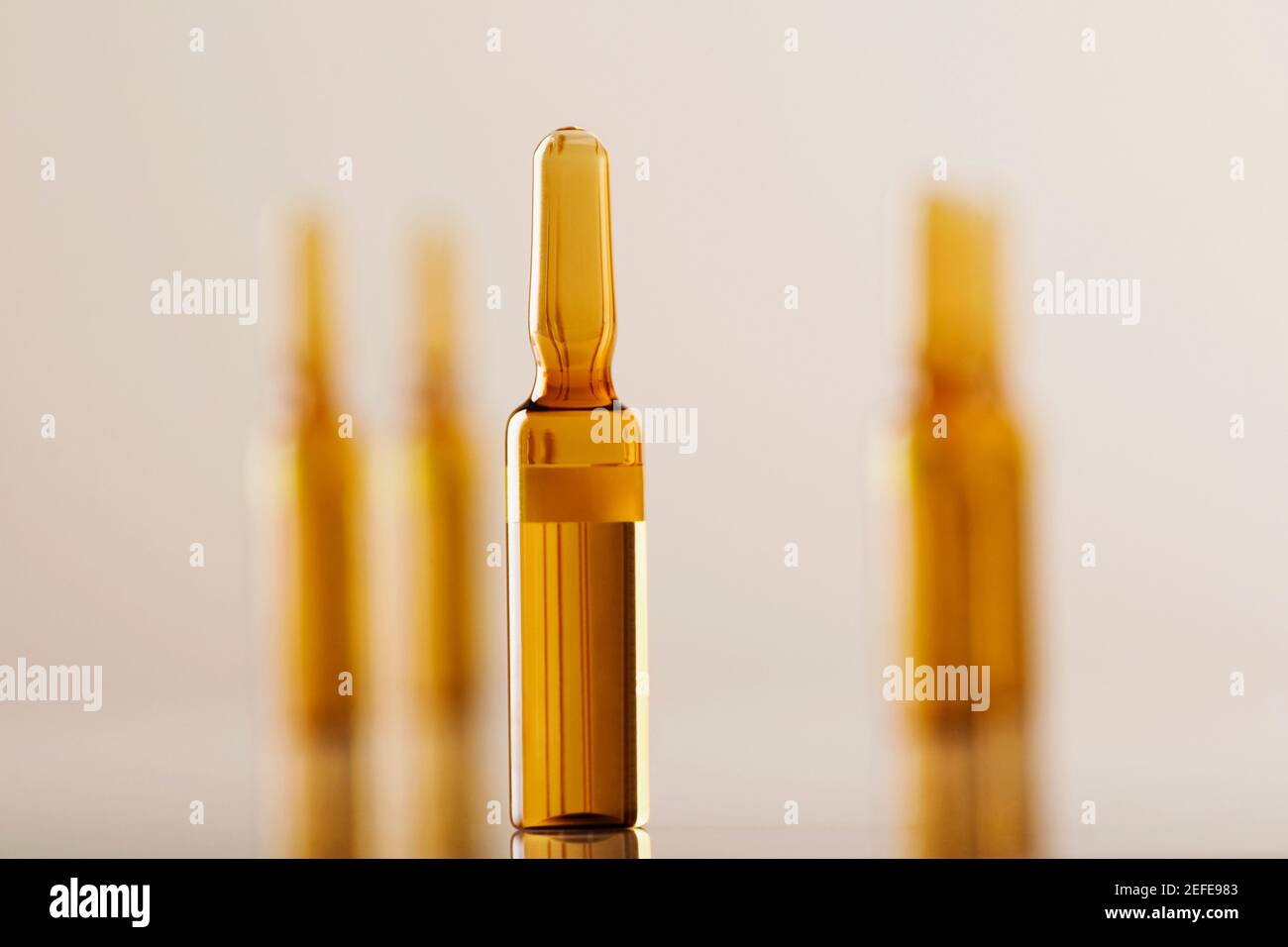 Four vial hi-res stock photography and images - Alamy