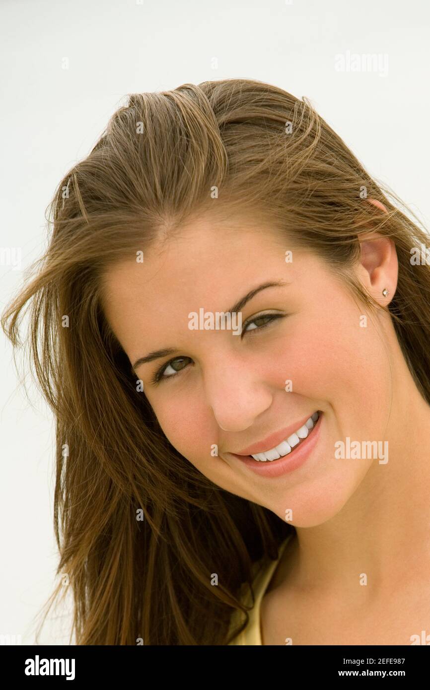 Portrait of a teenage girl smiling Stock Photo - Alamy