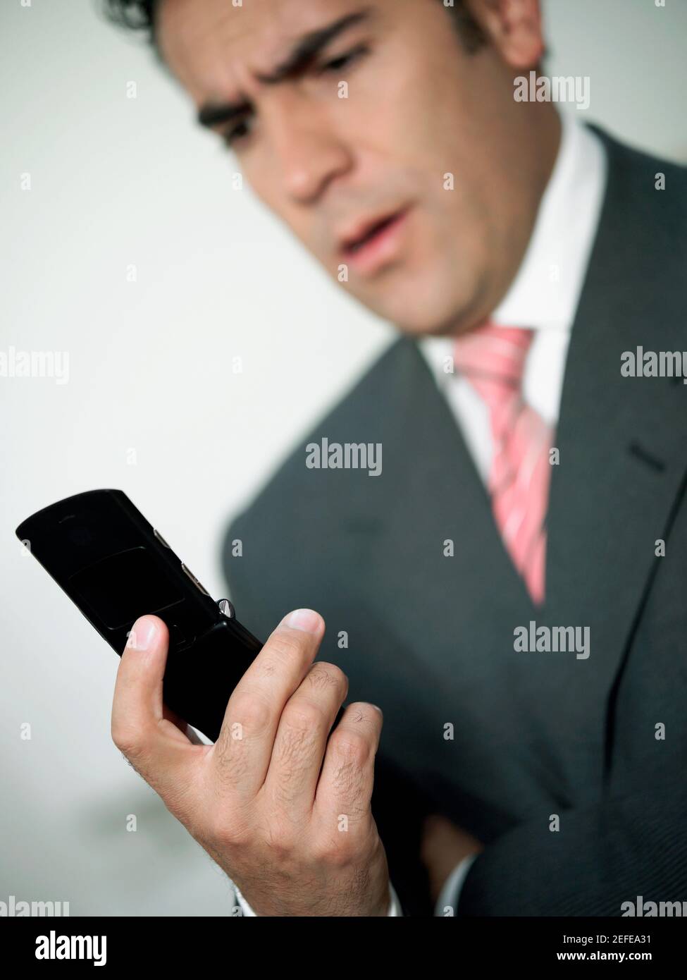 Man 40 years surprised mobile phone hi-res stock photography and images ...