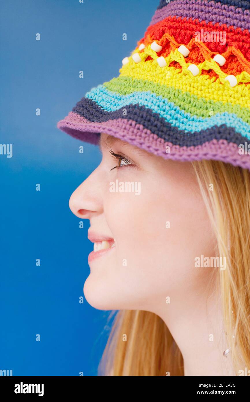 Side profile of a young woman smiling Stock Photo - Alamy