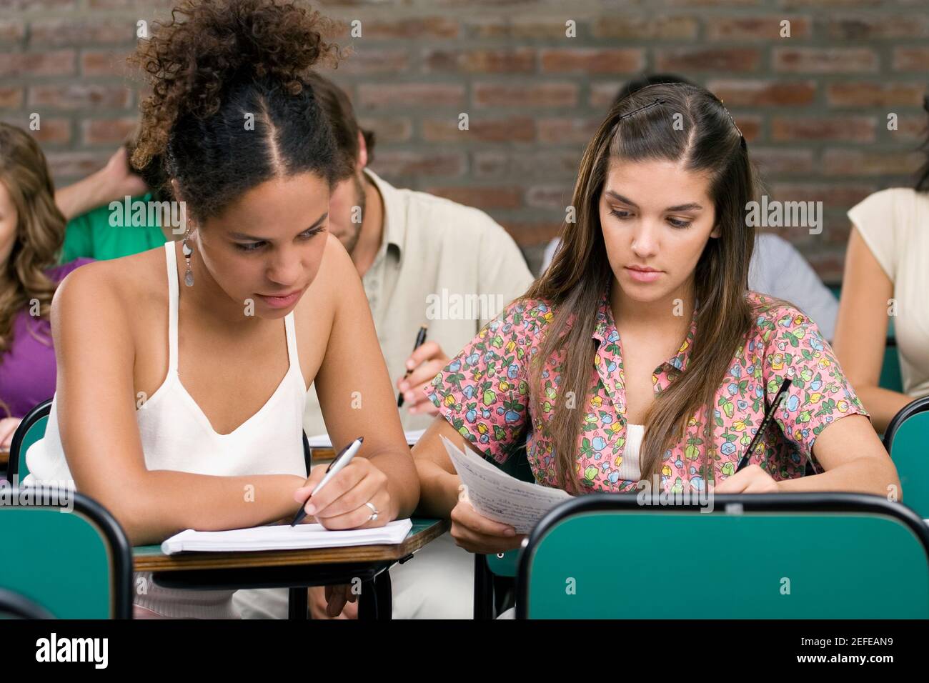 University students studying in a classroom Stock Photo - Alamy