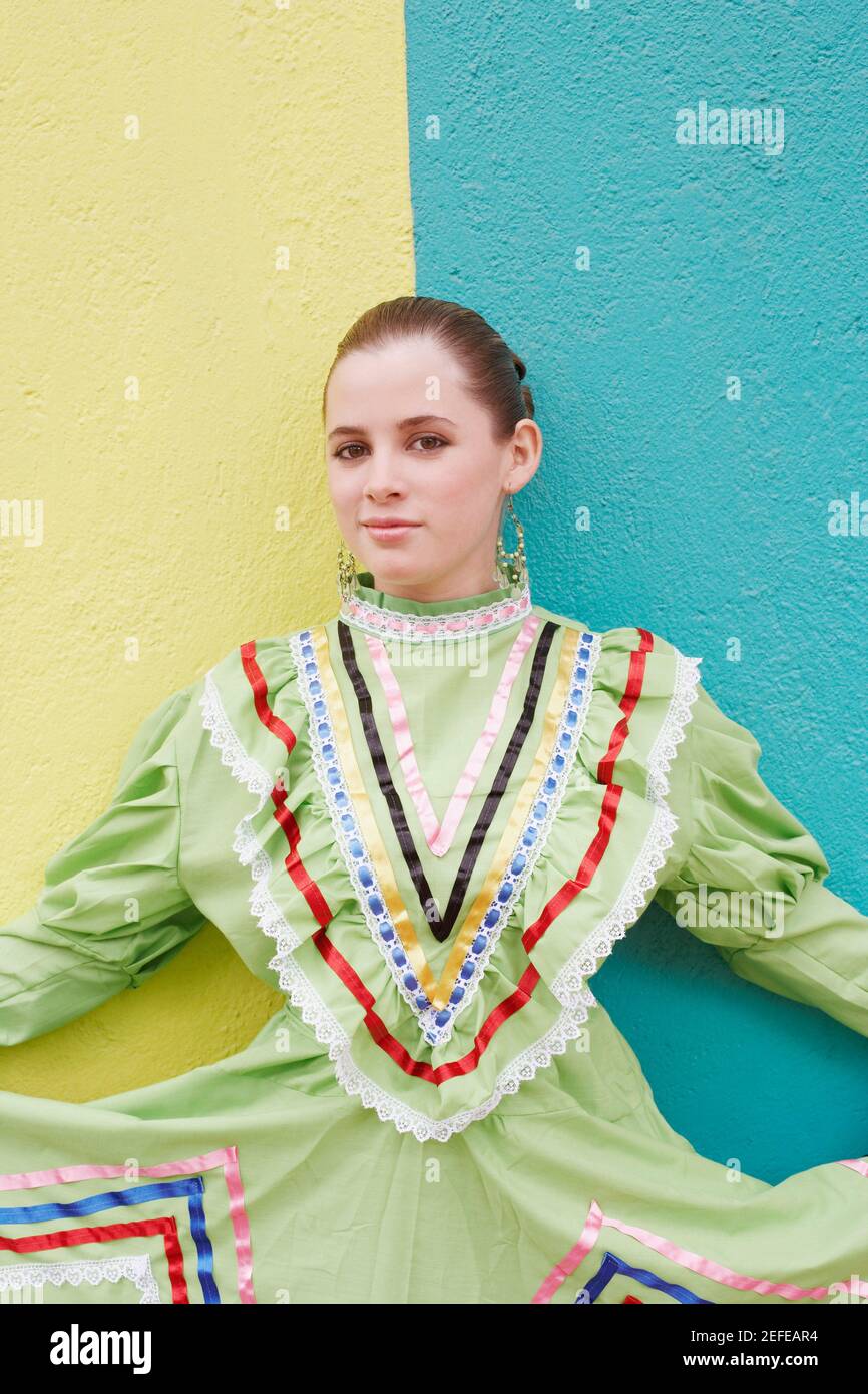 Portrait of a young woman smirking Stock Photo - Alamy