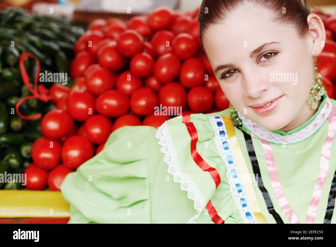 Portrait of a young woman at a market stall Stock Photo - Alamy
