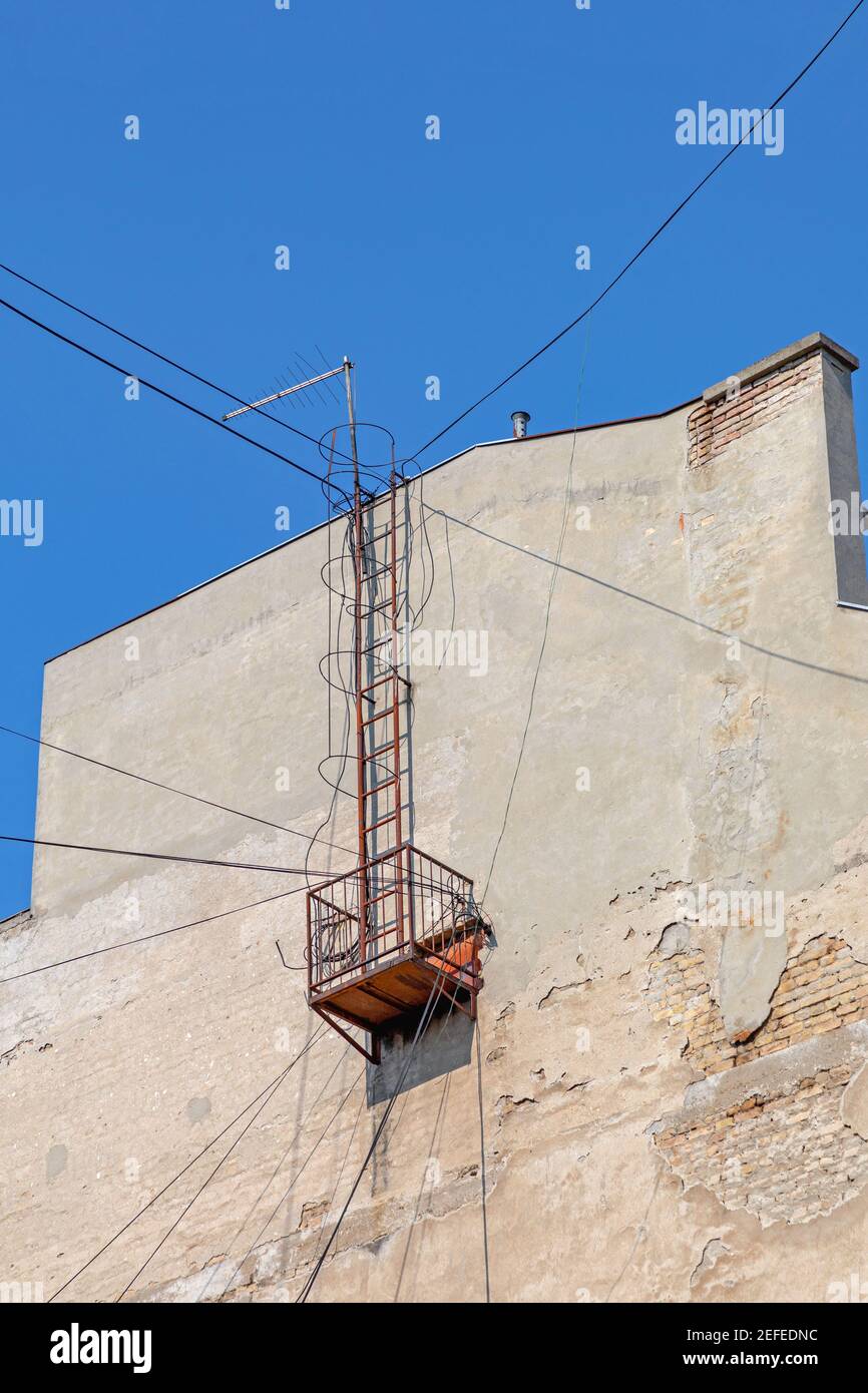 Exit and External Ladder to Building Roof Stock Photo - Alamy