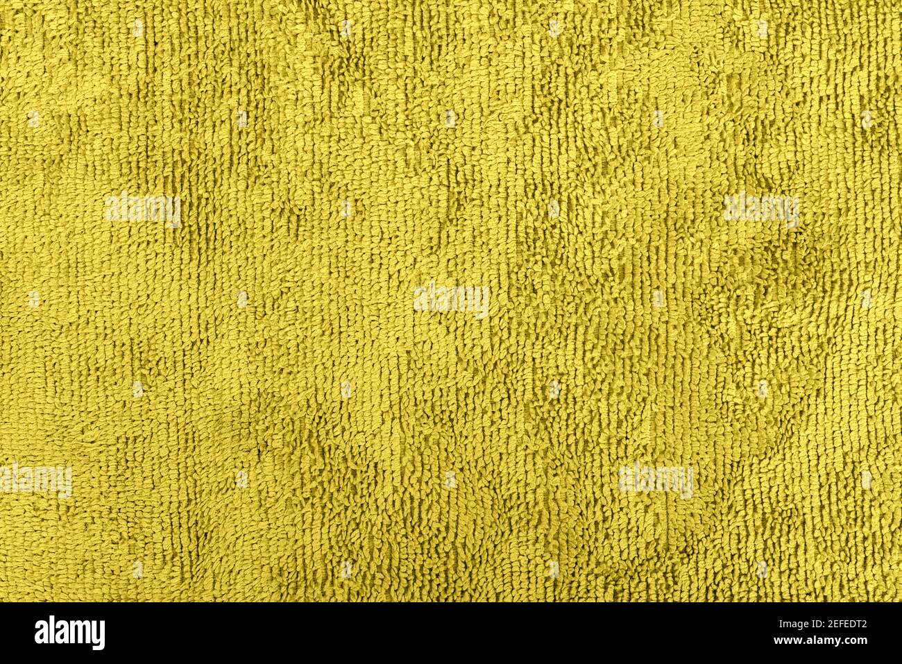 Background or texture made of yellow microfiber fabric Stock Photo - Alamy