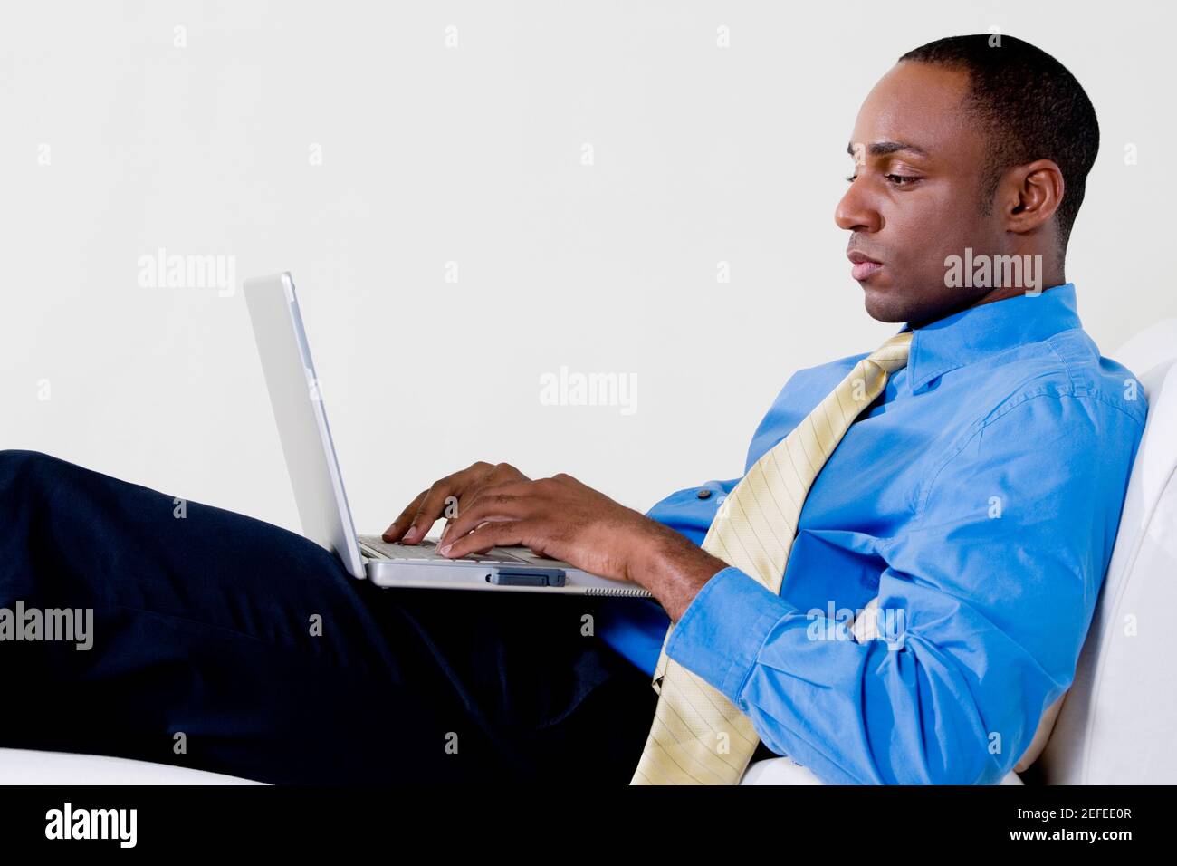 Concentrated african american businessman using hi-res stock ...