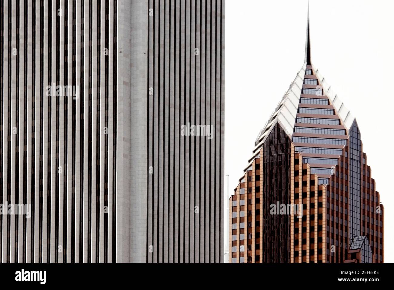 Close-up of two buildings in a city, Aon Center, Prudential Plaza Tower ...