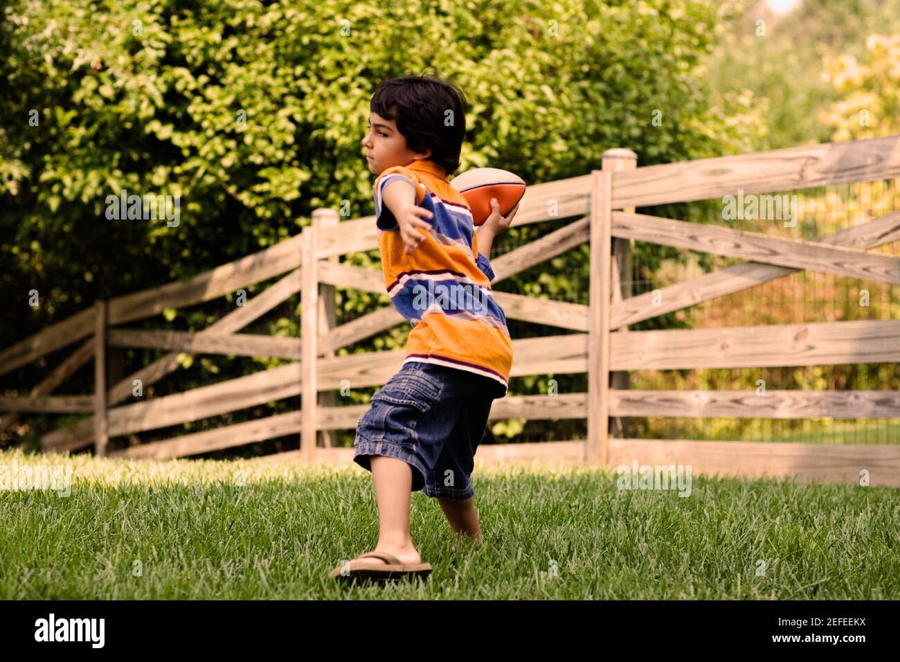 Boy Throwing A Ball High Resolution Stock Photography and Images - Alamy