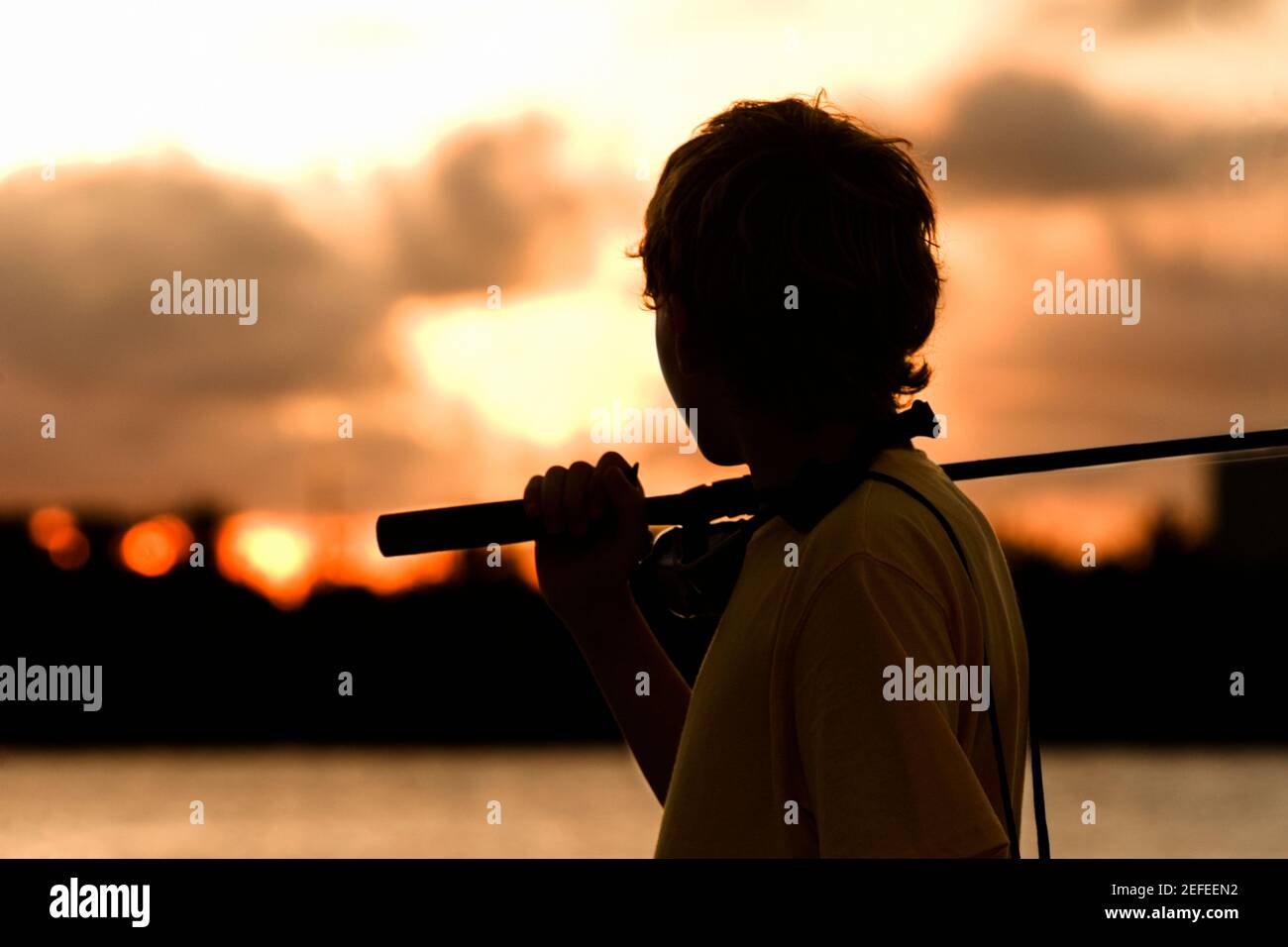Carrying fishing rod hi-res stock photography and images - Alamy
