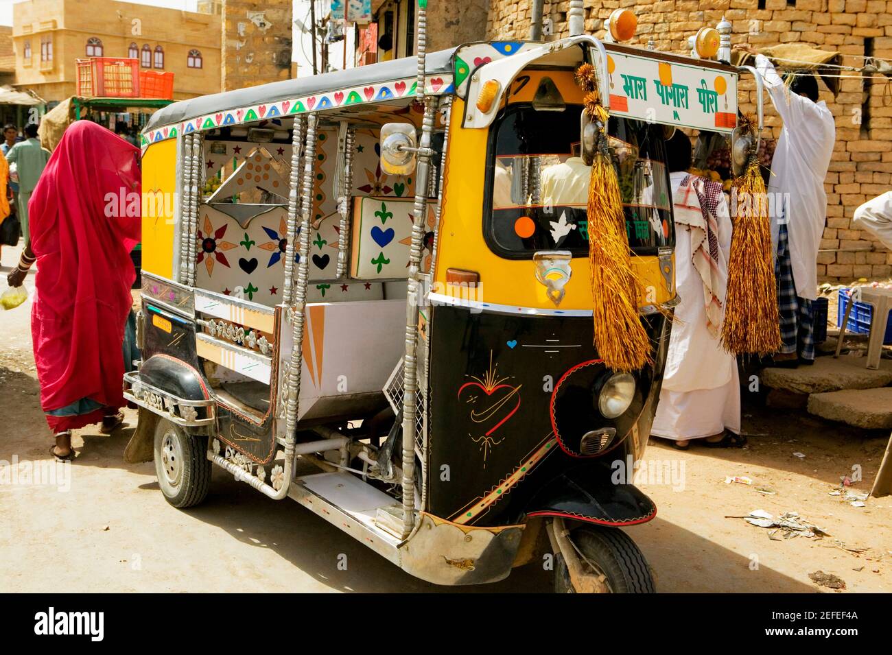 Rickshaw parked on the street, Jaisalmer, Rajasthan, India Stock Photo ...