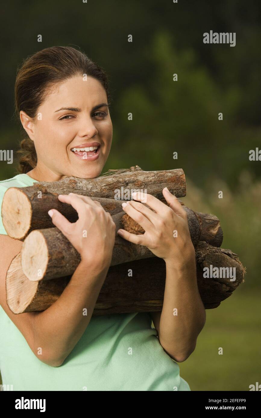 Young standing on a log of wood hi-res stock photography and images - Alamy