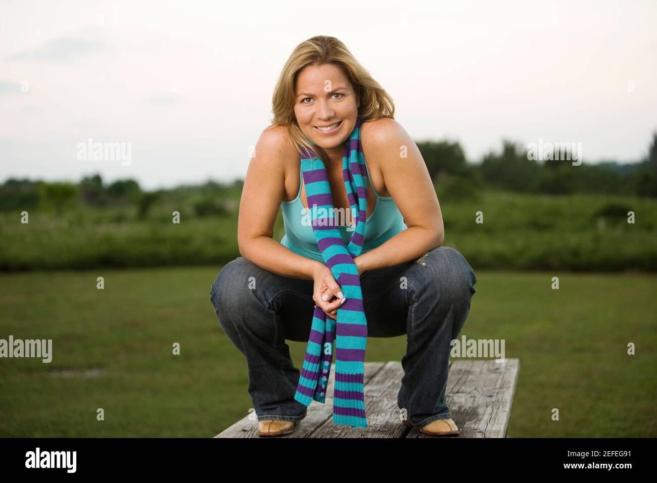 Blue and green striped tank top hi-res stock photography and images - Alamy