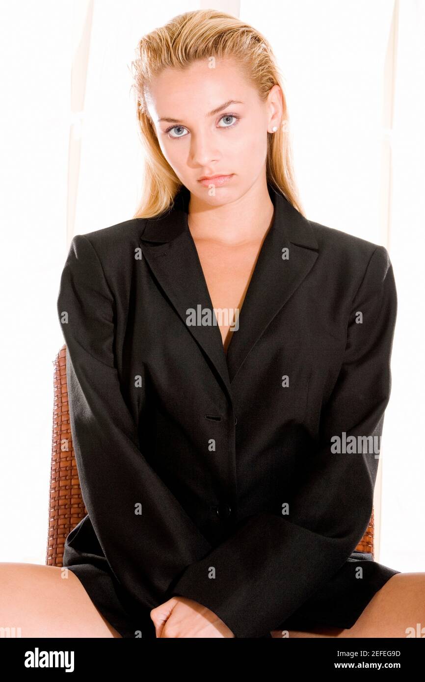 Sitting with legs apart hi-res stock photography and images - Alamy