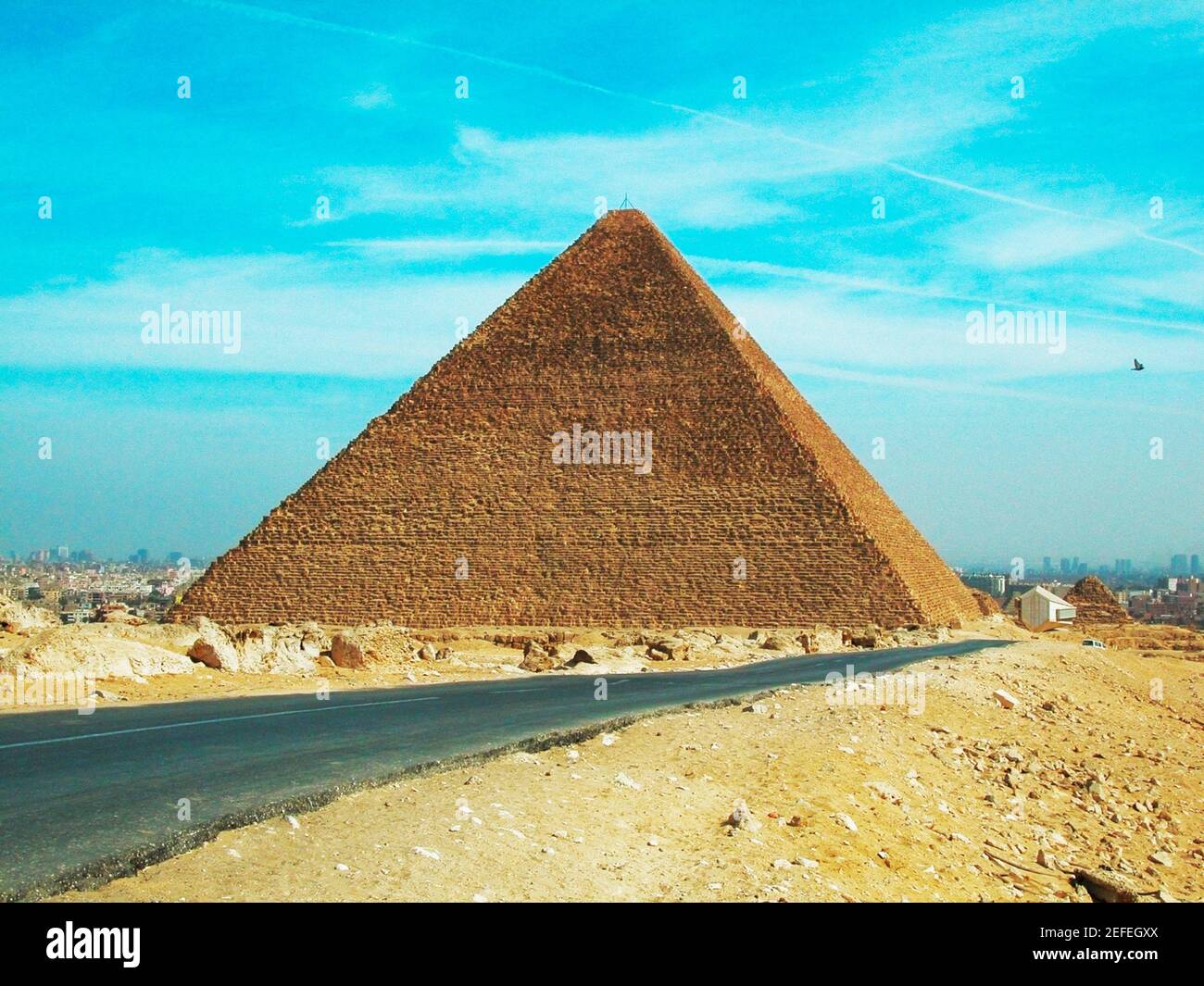 Pyramid along a road, Giza Pyramids, Giza, Cairo, Egypt Stock Photo - Alamy