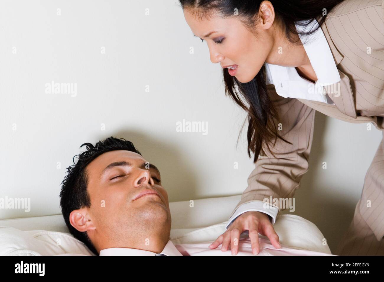 Woman bending over head down hi-res stock photography and images - Alamy