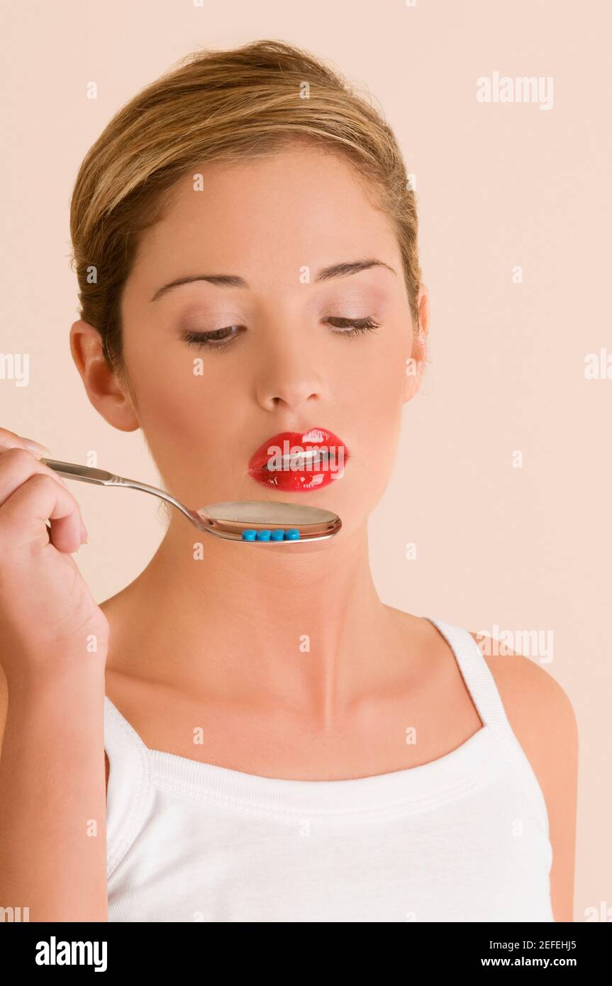 Female young spoon caucasian vertical hi-res stock photography and ...