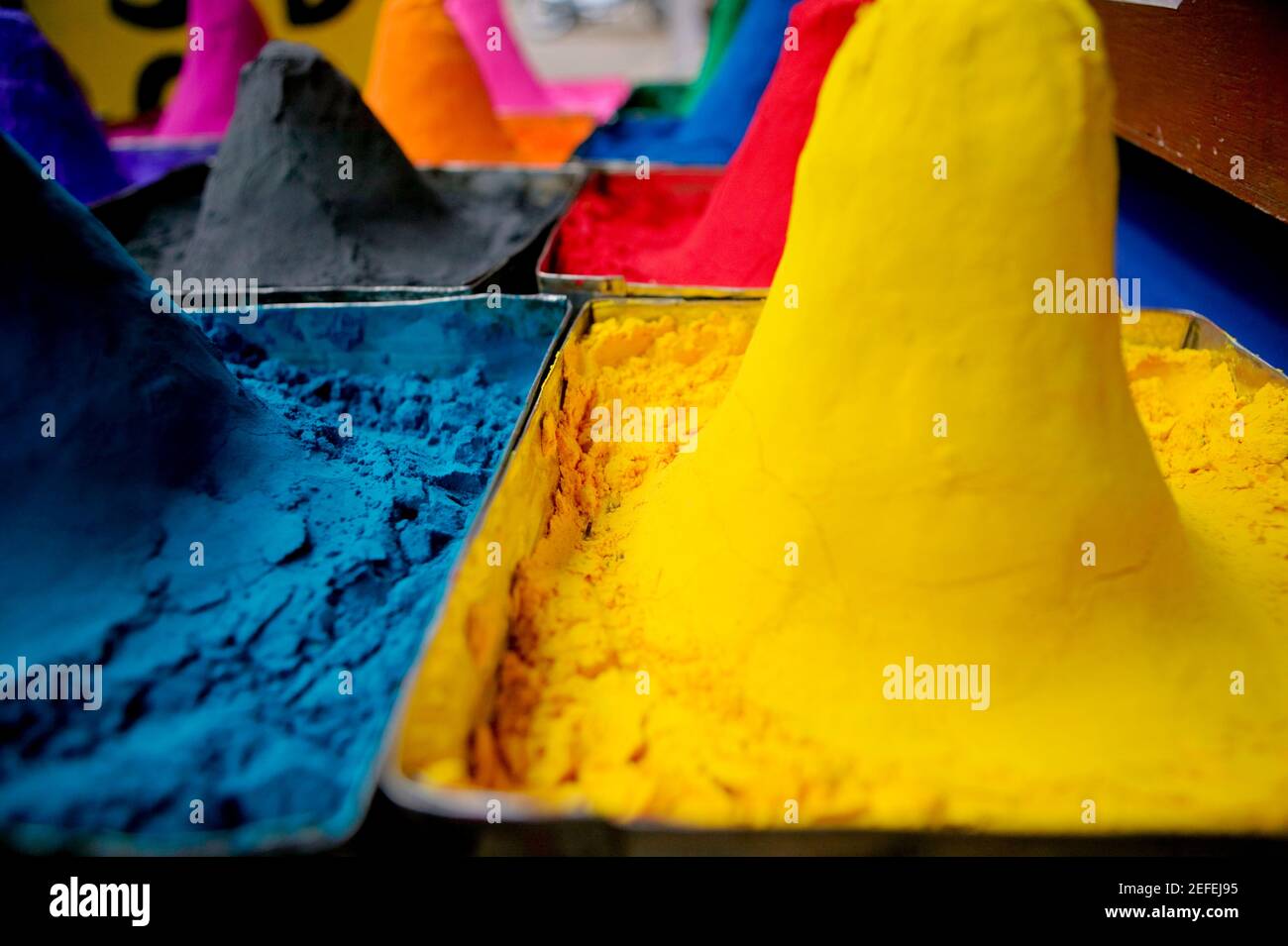 Close-up of mounds of colored powder used for Hindu rituals, Pushkar ...