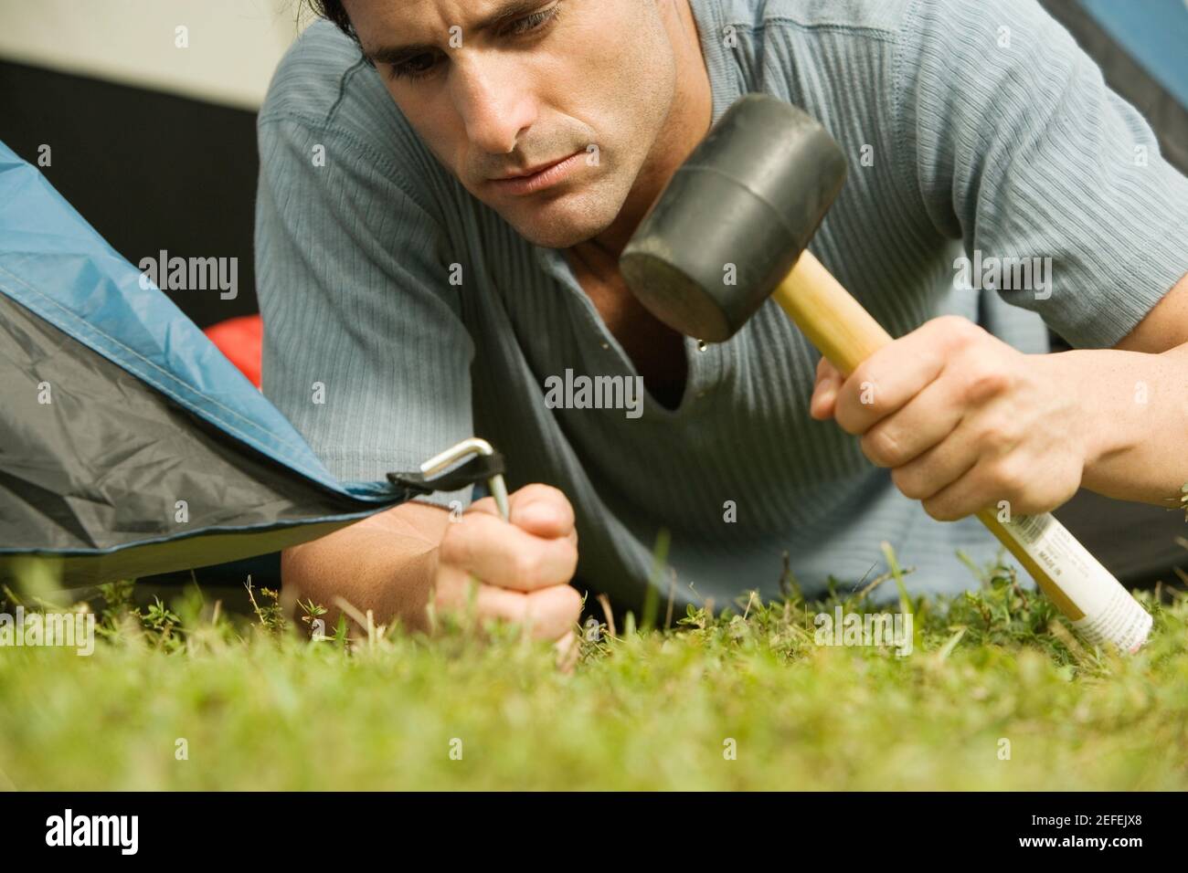 Man looking at surface close up hi-res stock photography and images - Alamy