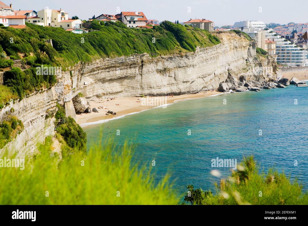 Cliffs at a seaside, Baie De Biarritz, Biarritz, Pyrenees Atlantiques ...