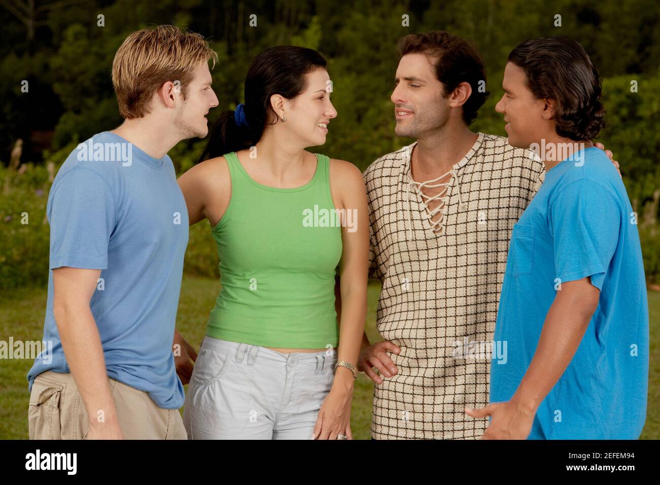 Friends talking to each other Stock Photo - Alamy