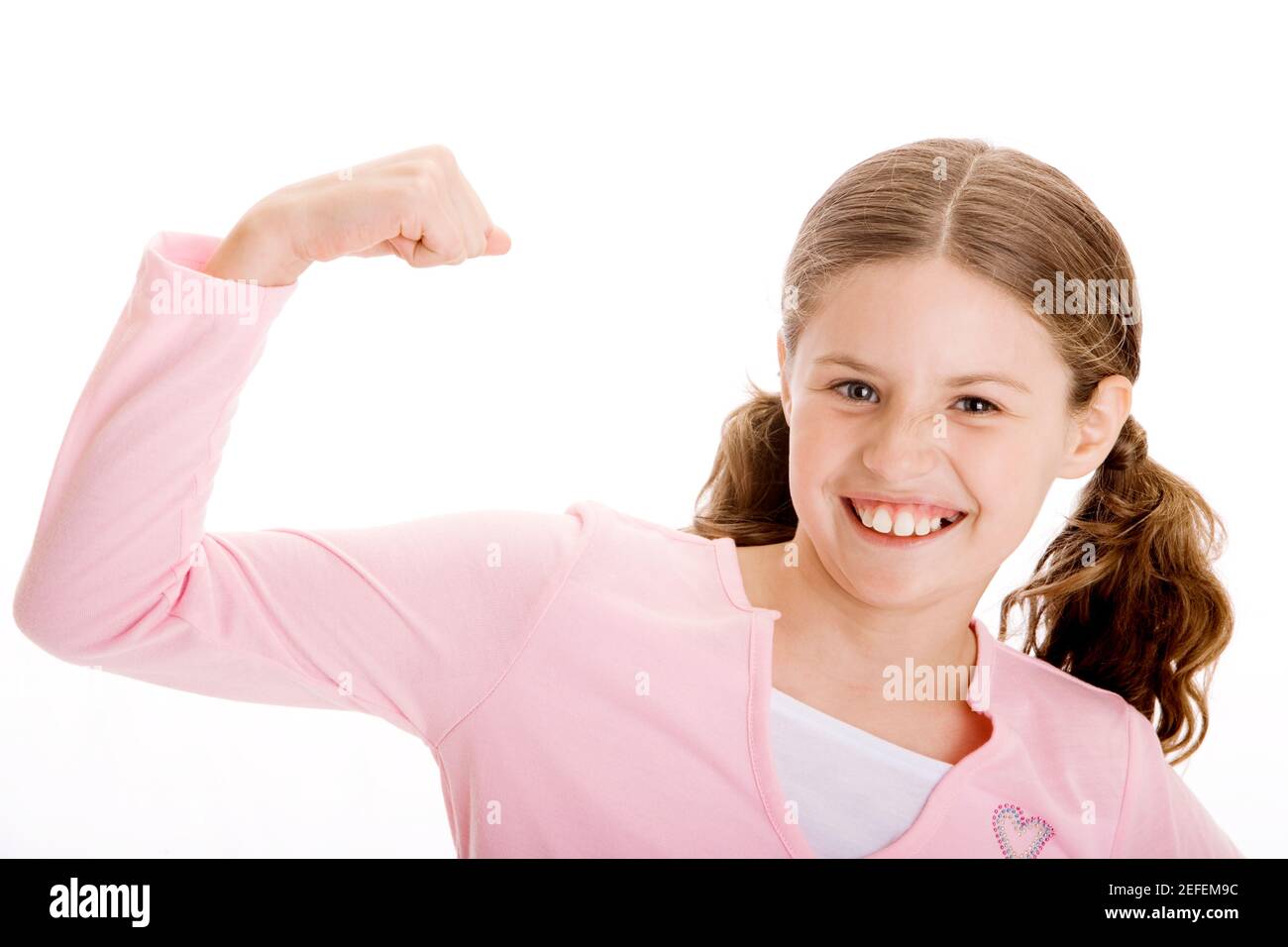 Kid flexing muscle hi-res stock photography and images - Alamy
