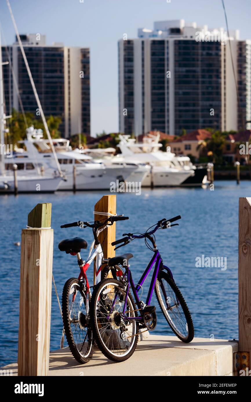 Bicycles parked on a dock Stock Photo - Alamy