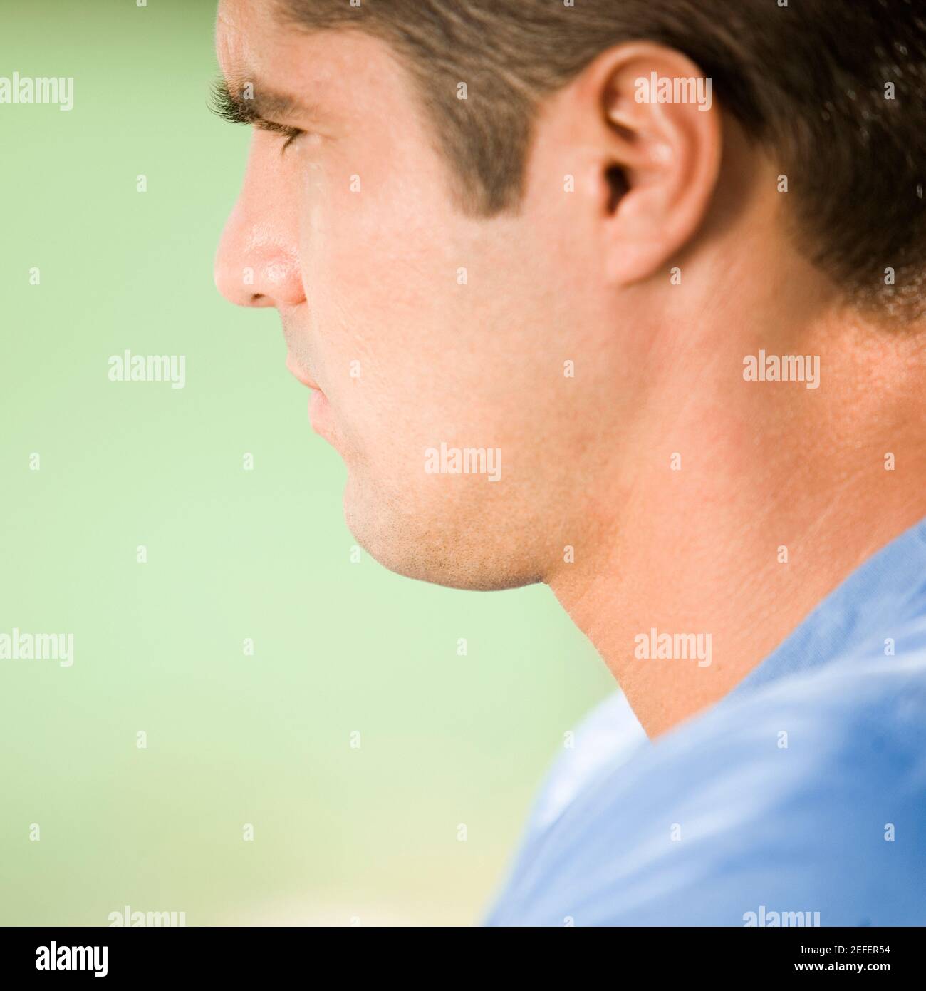 Side profile of a serious mid adult man Stock Photo - Alamy