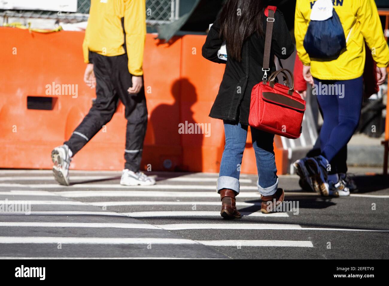 Three men crossing the road hi-res stock photography and images - Alamy
