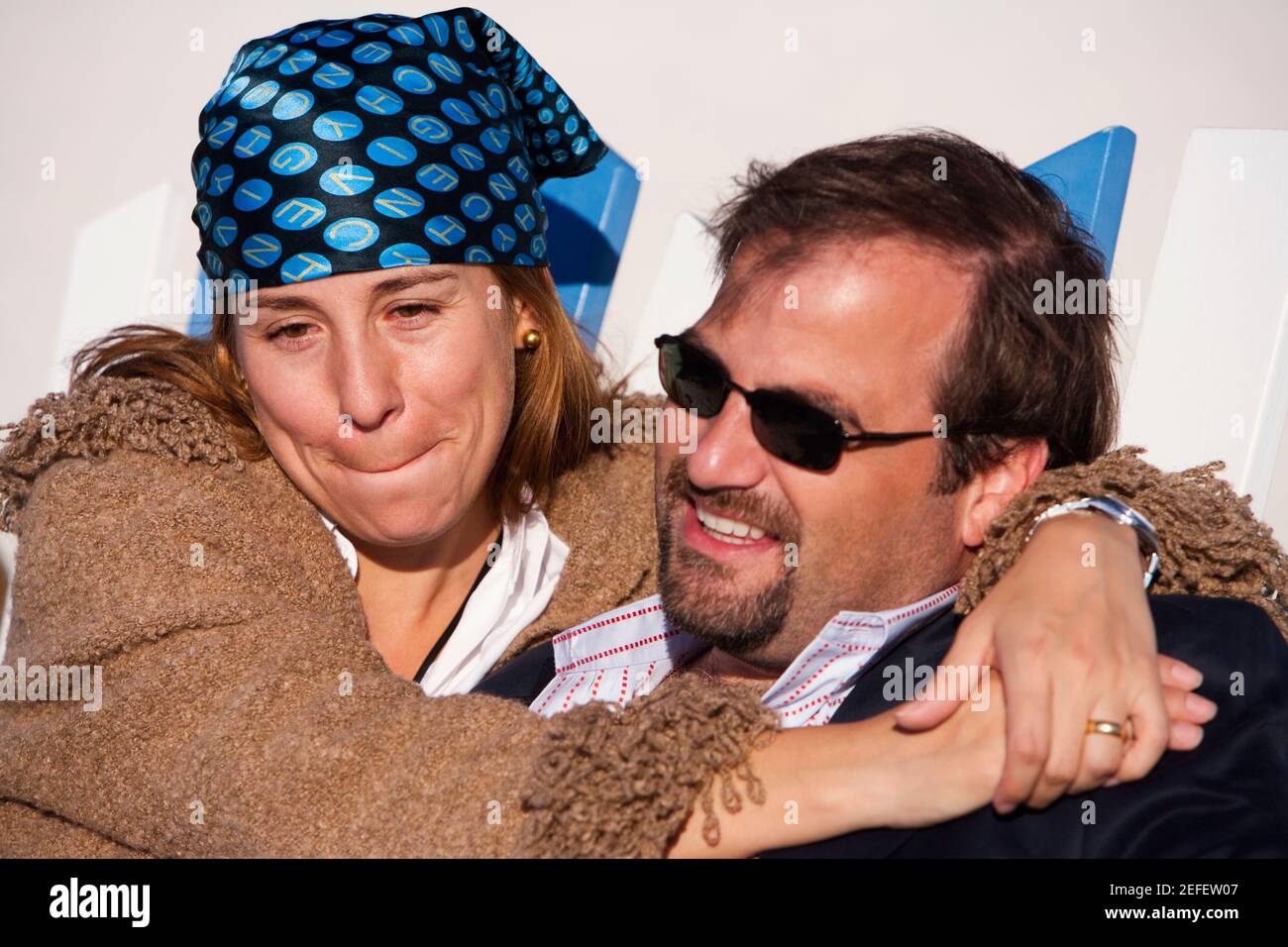Mid adult couple face to face arm around hi-res stock photography and ...