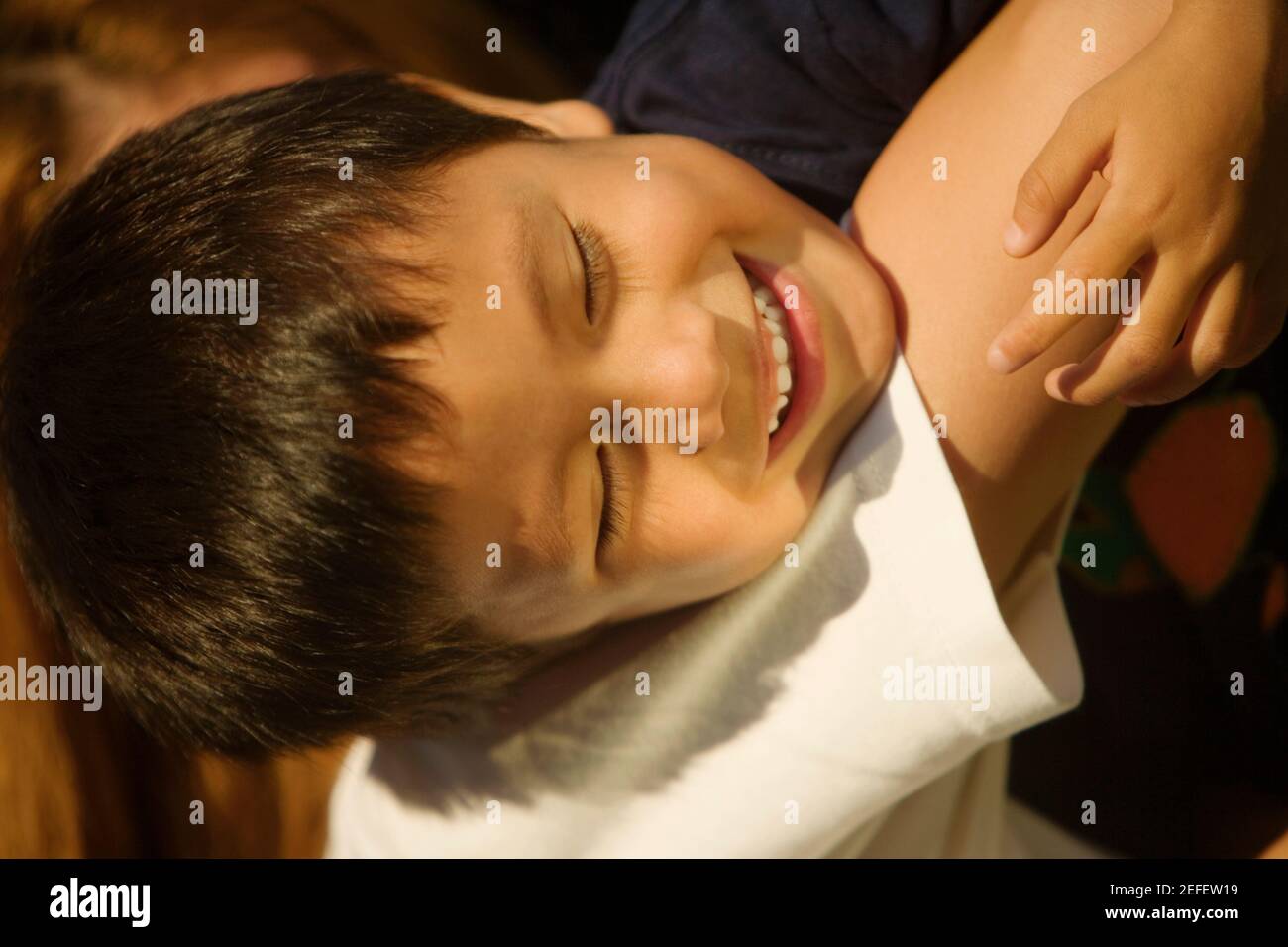 Side profile of a boy smiling Stock Photo - Alamy