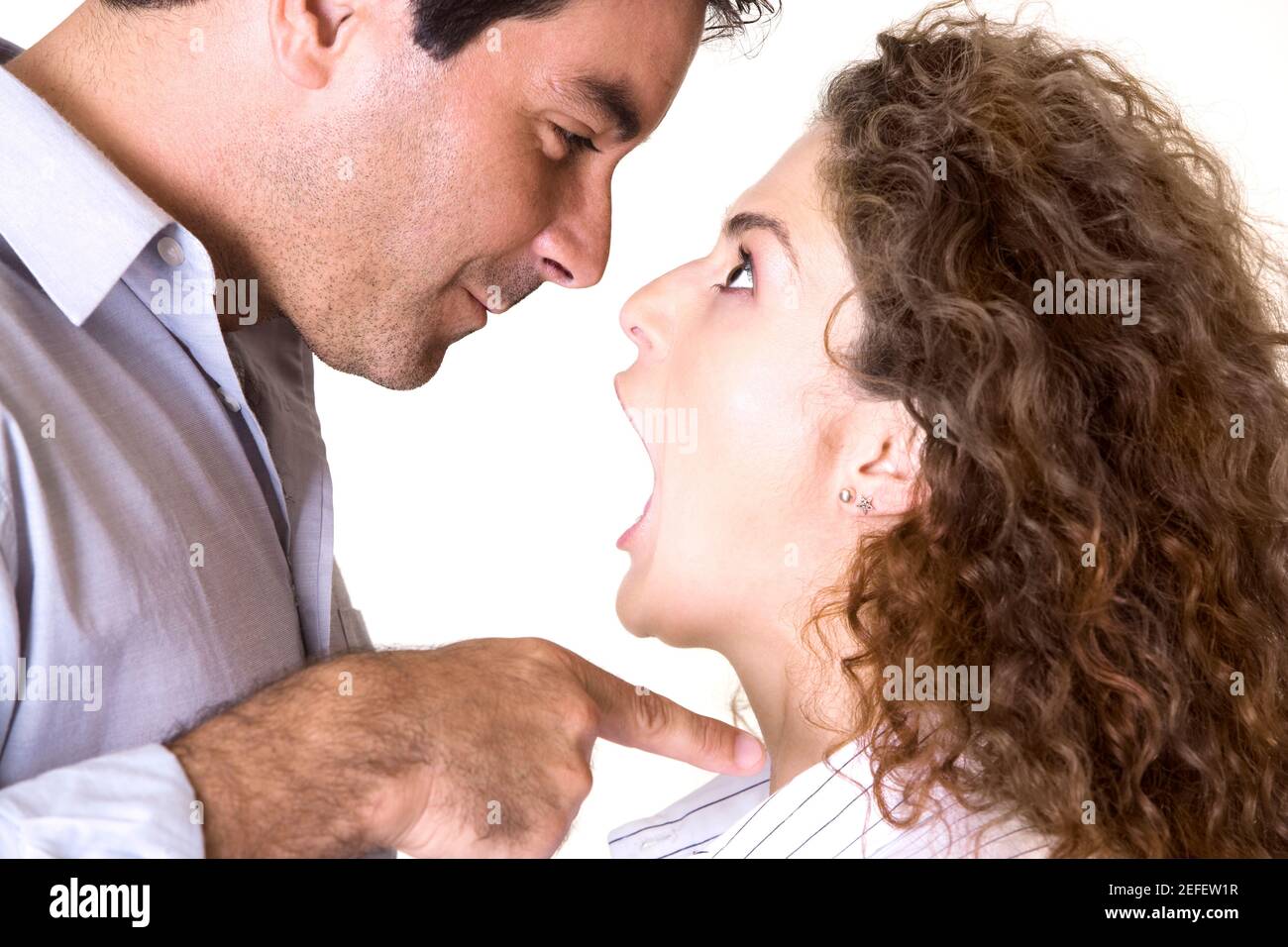 Side profile of a man and a woman arguing hi-res stock photography and ...