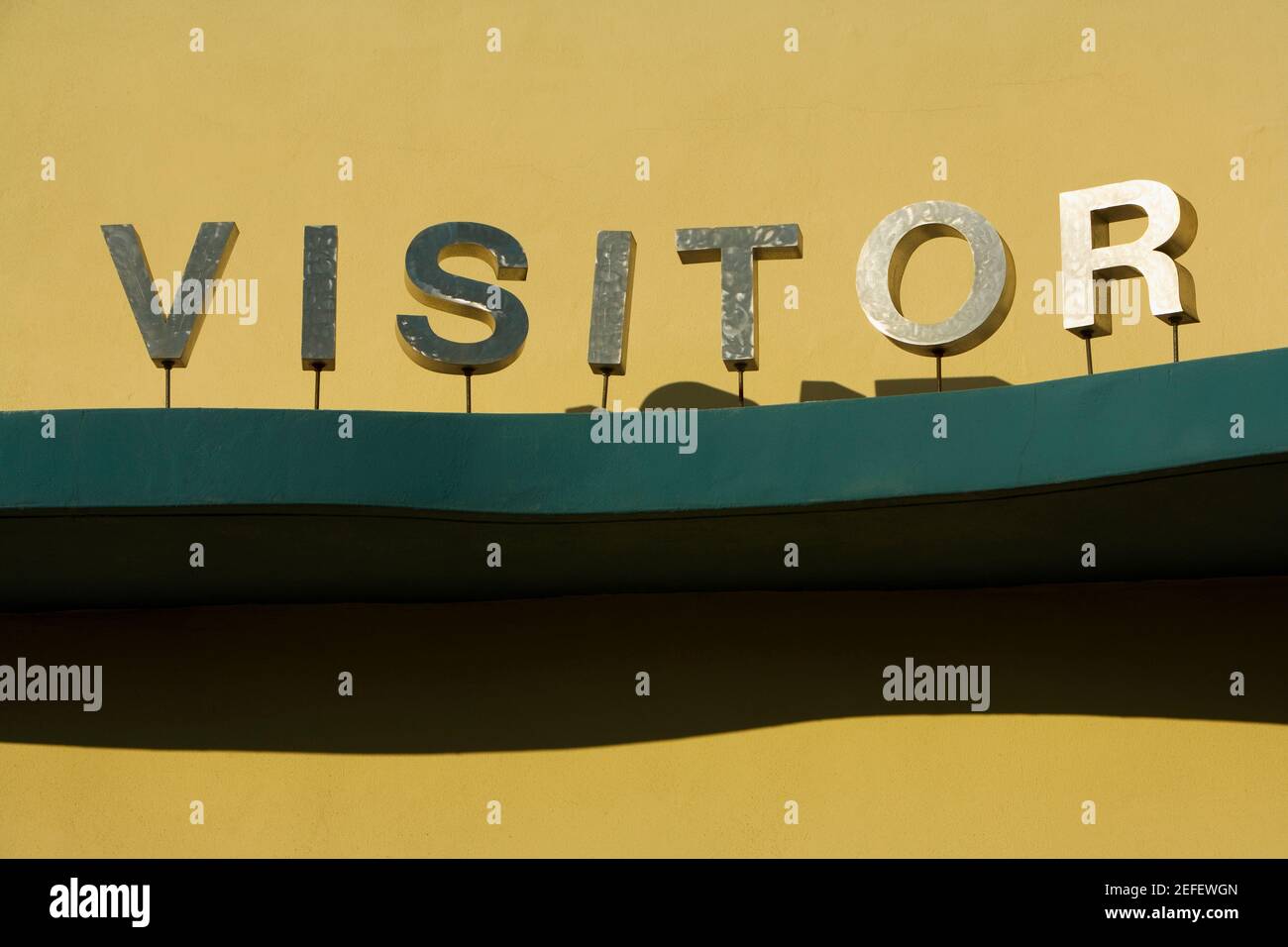 Low angle view of text on the wall Stock Photo - Alamy