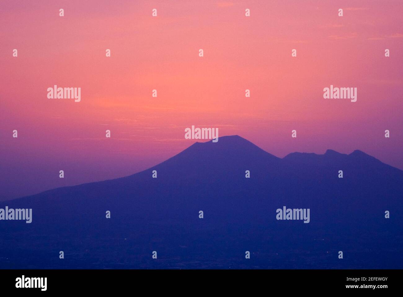 Silhouette of a mountain at dusk, Mt Vesuvius, Bay of Naples, Naples ...