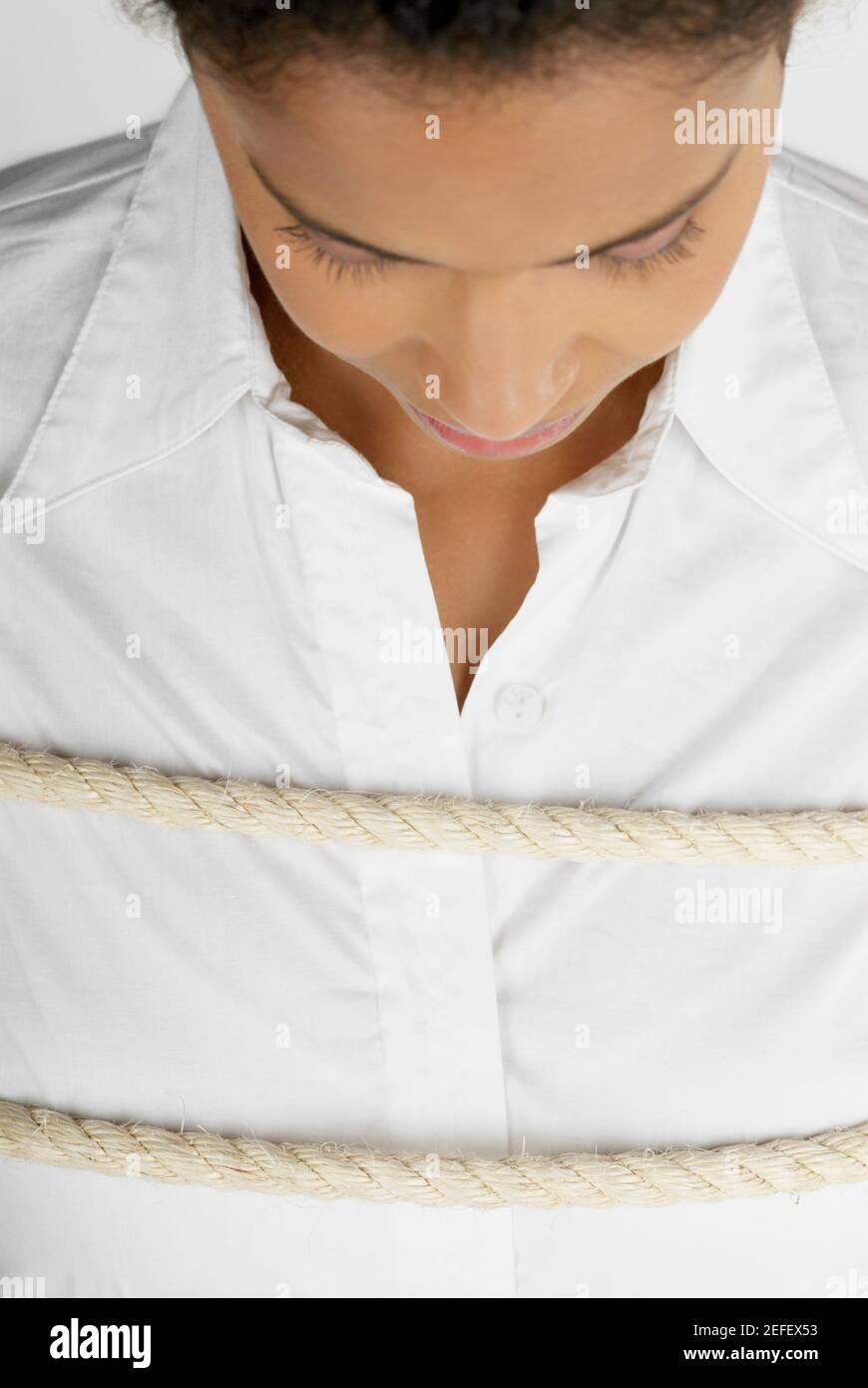 Young woman tied up rope hi-res stock photography and images - Alamy