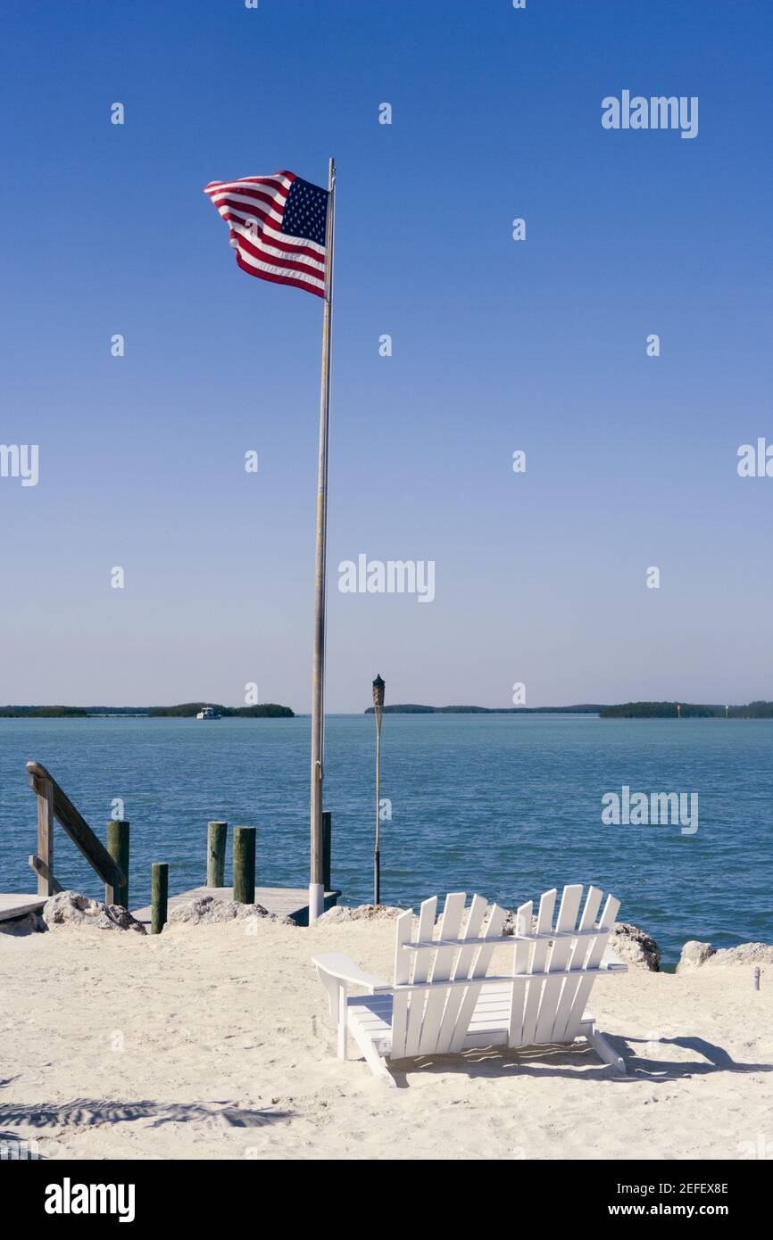 American flag fluttering on the beach Stock Photo - Alamy