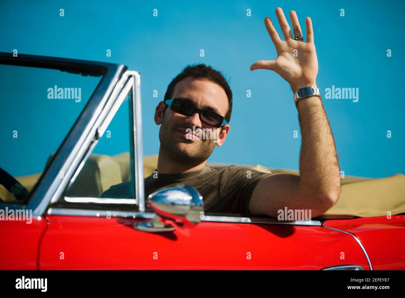 Man waving arms hi-res stock photography and images - Alamy