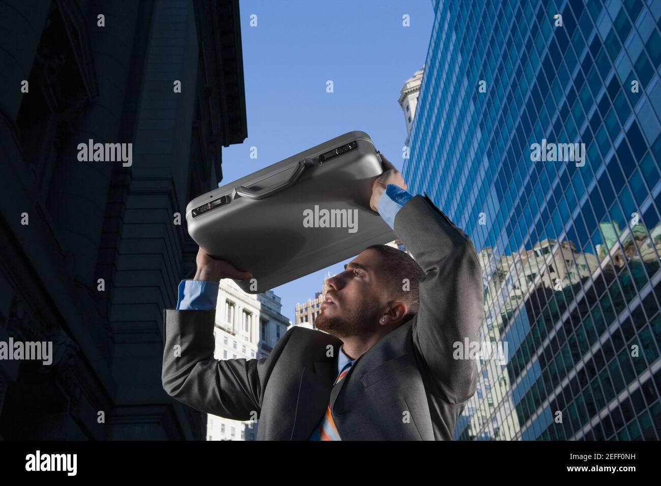 Person with arms protecting head hi-res stock photography and images ...