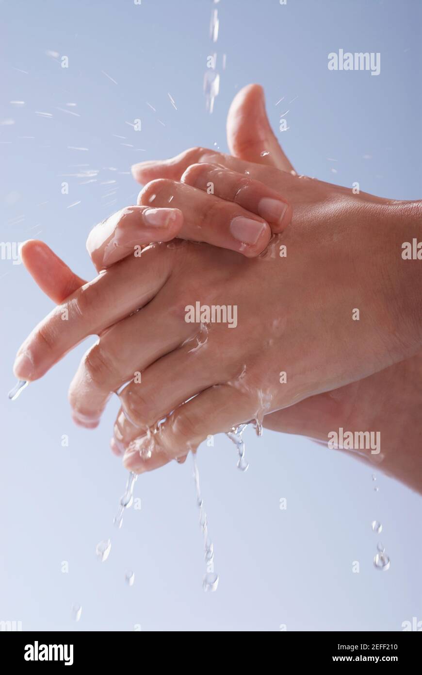 Interior with a woman washing her hands hi-res stock photography and ...
