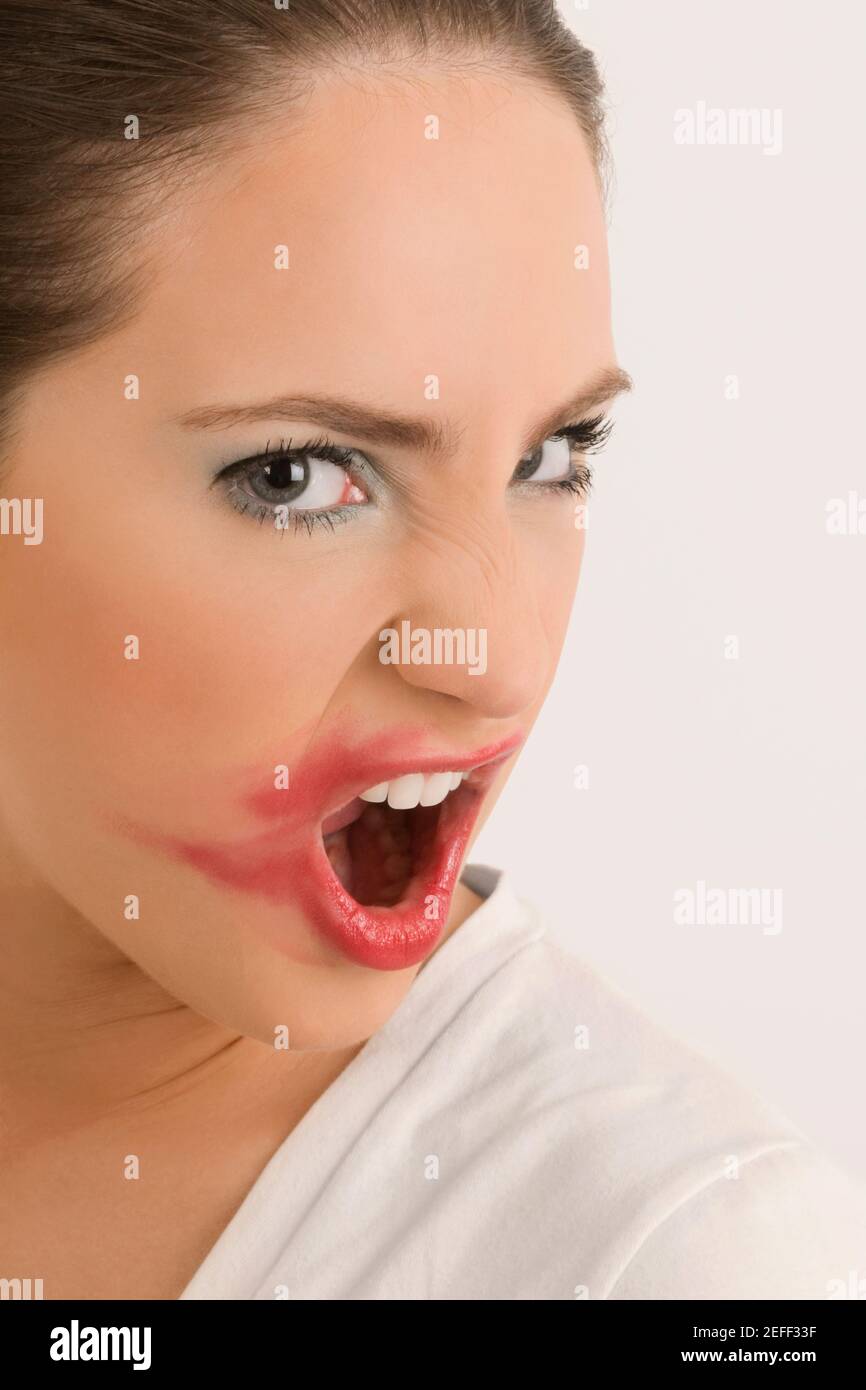 Portrait of a young woman with her messy lips Stock Photo - Alamy