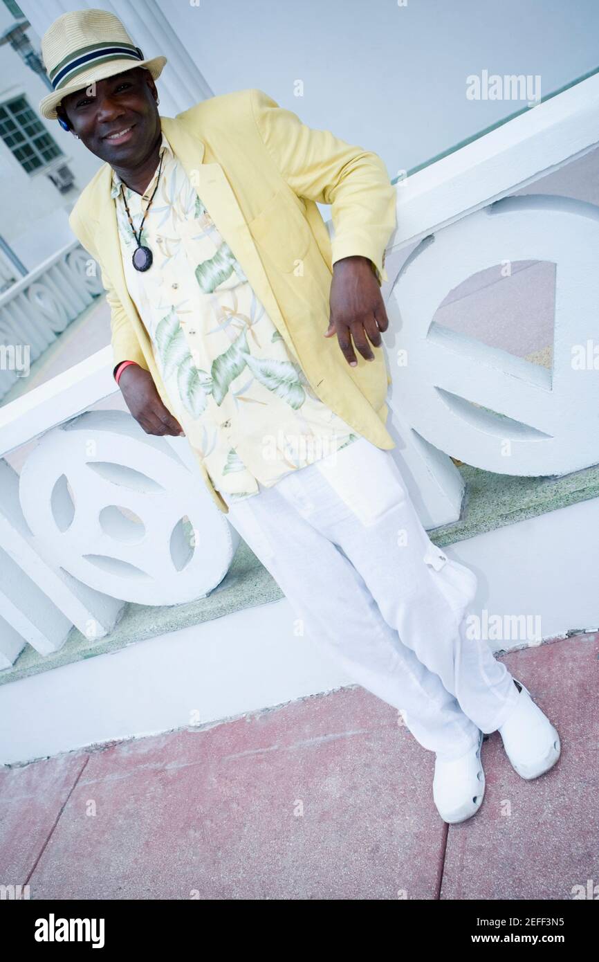 Man leaning against balustrade hi-res stock photography and images - Alamy