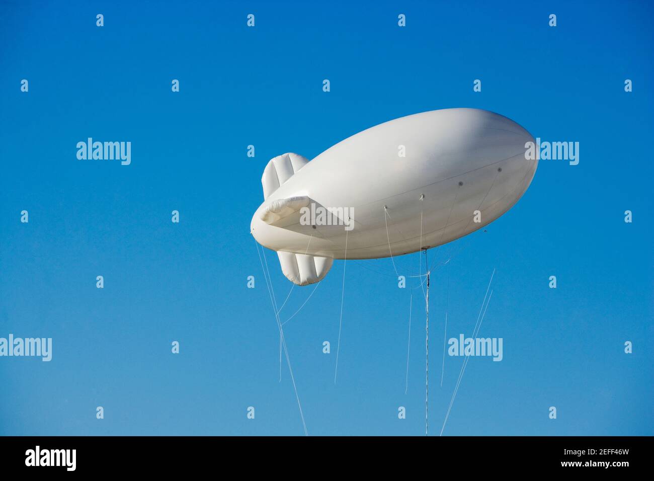 Low angle view of a blimp in the sky Stock Photo - Alamy