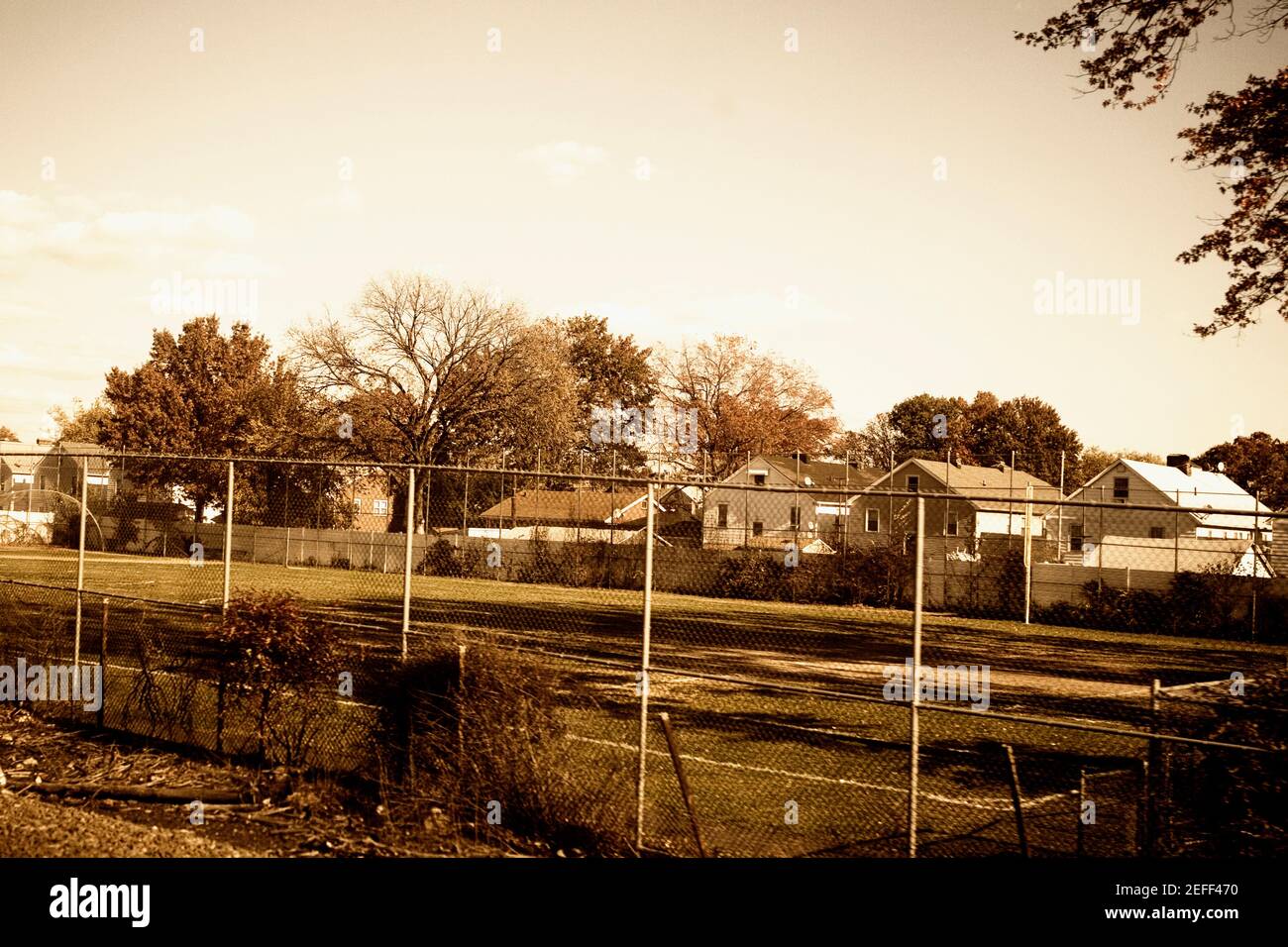 Park near buildings in a village Stock Photo - Alamy
